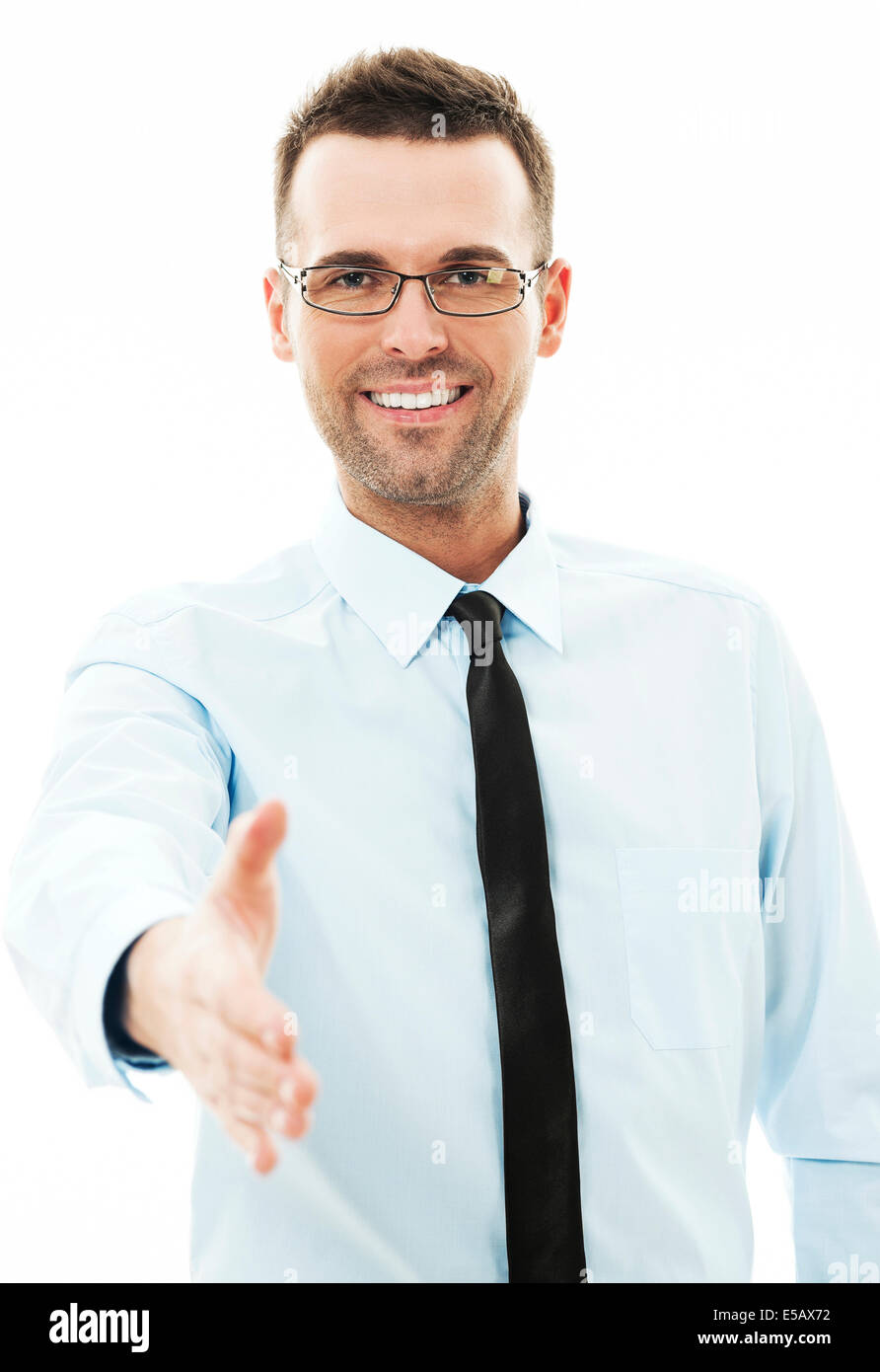 Businessman giving hand for handshake Debica, Poland Stock Photo - Alamy