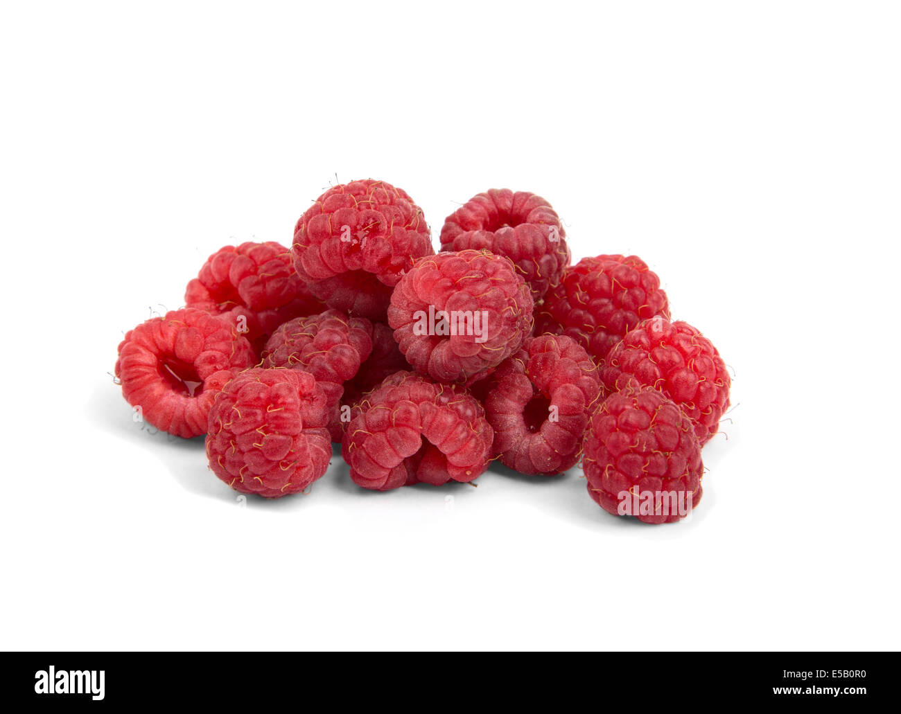 juicy ripe raspberries on a white background Stock Photo - Alamy