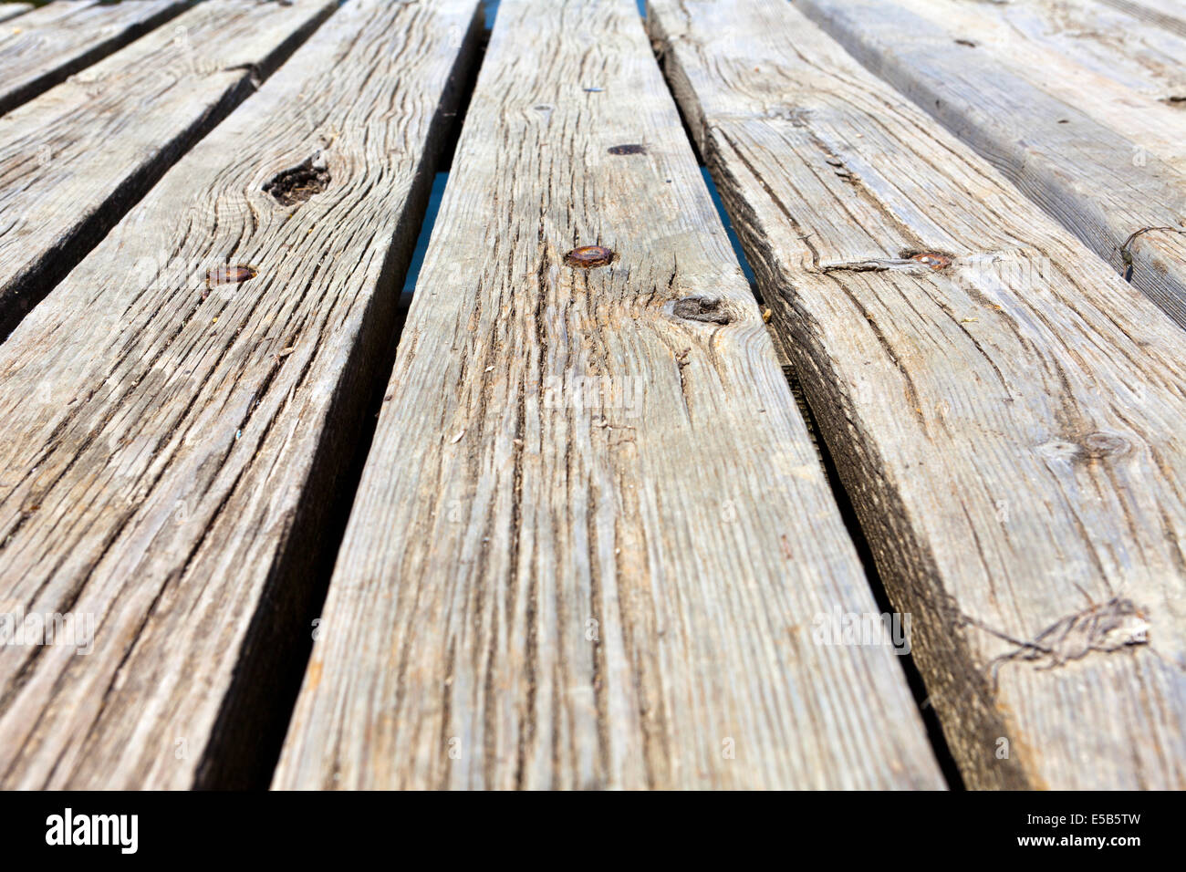 Diagonal view across old gray hard planks of a bathing jetty Stock ...