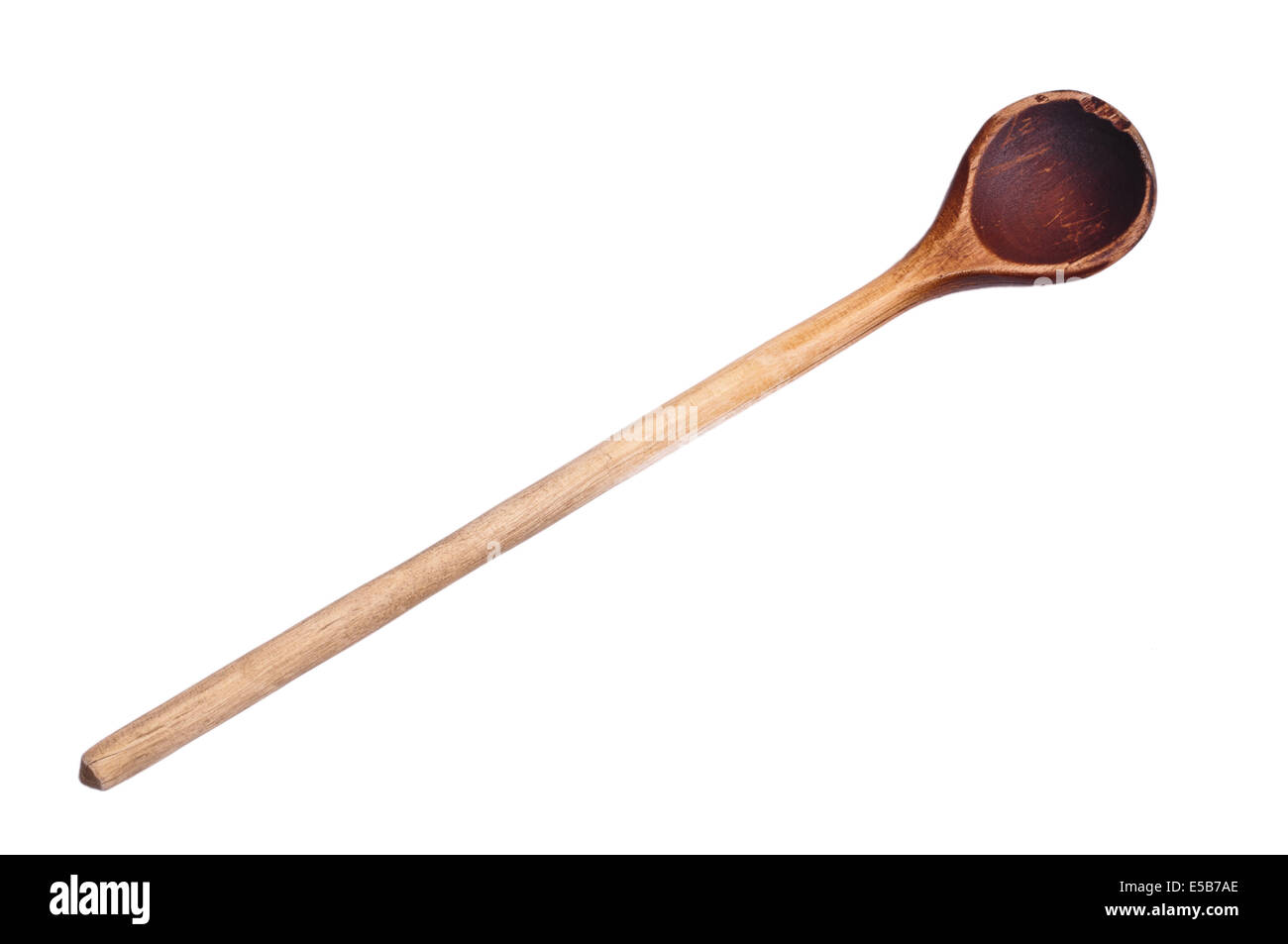 Old wooden used cooking spoon isolated Stock Photo - Alamy