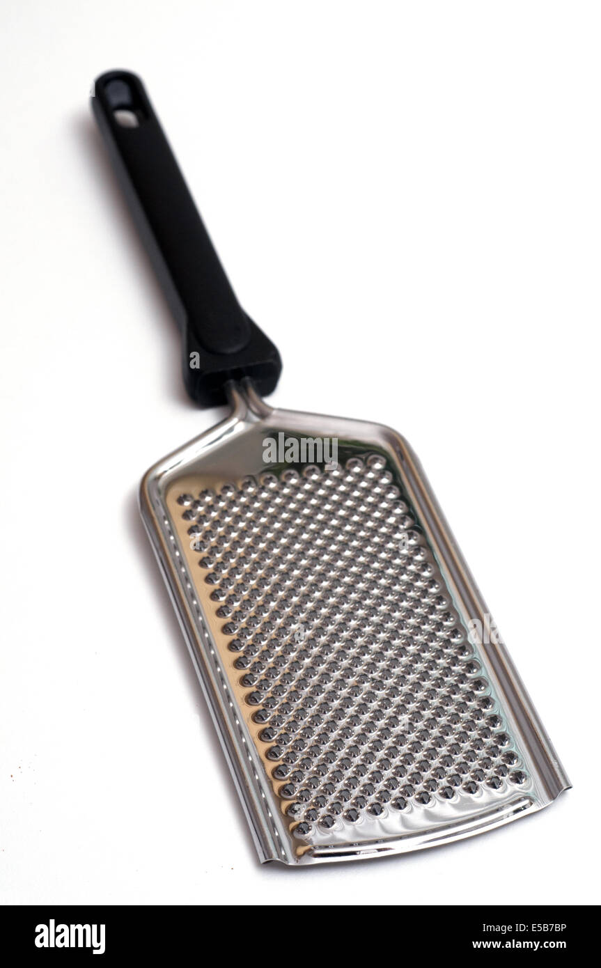 Nutmeg grater of stainless steel in front of a white background Stock ...