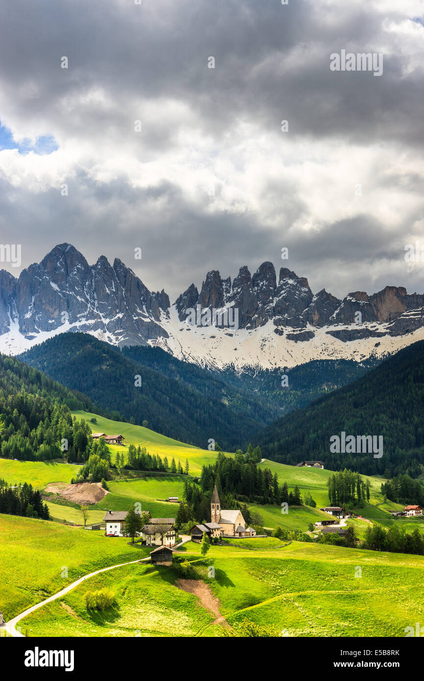 The Odle mountain peaks and the church of Santa Maddalena are the ...