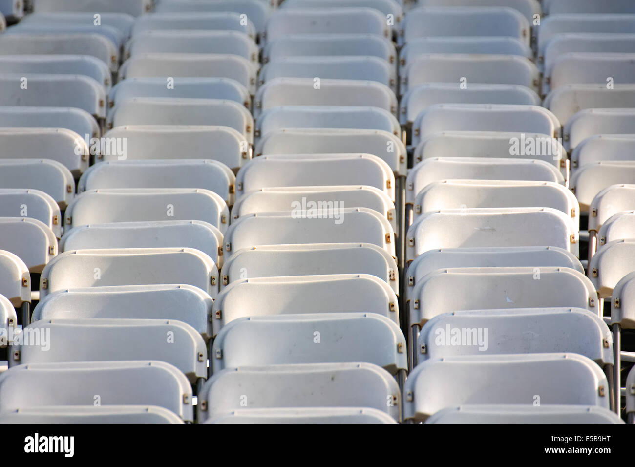 Row upon row of empty chairs waiting for the audience at a university ...