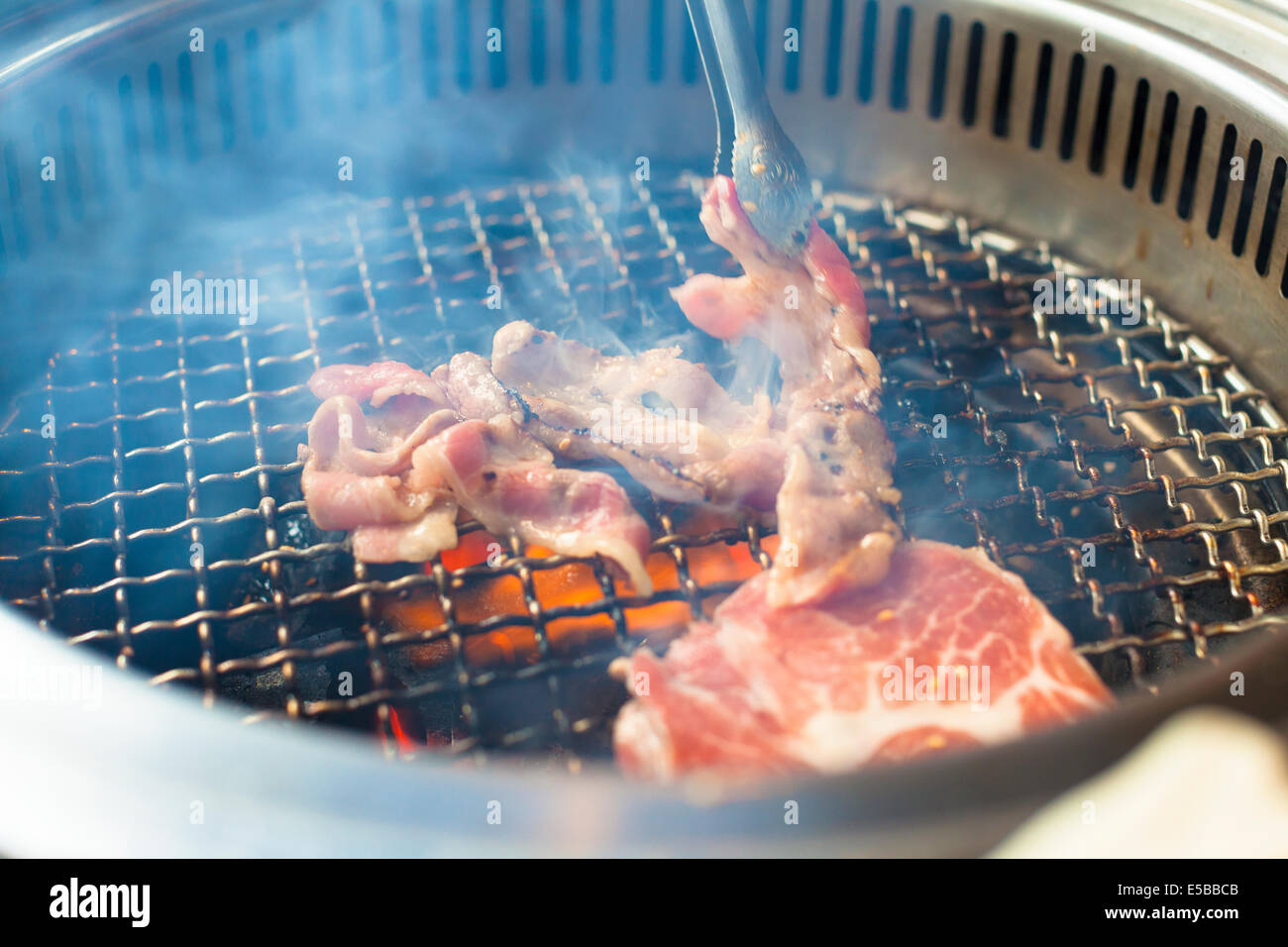 Cooking meat on a grill hi-res stock photography and images - Alamy