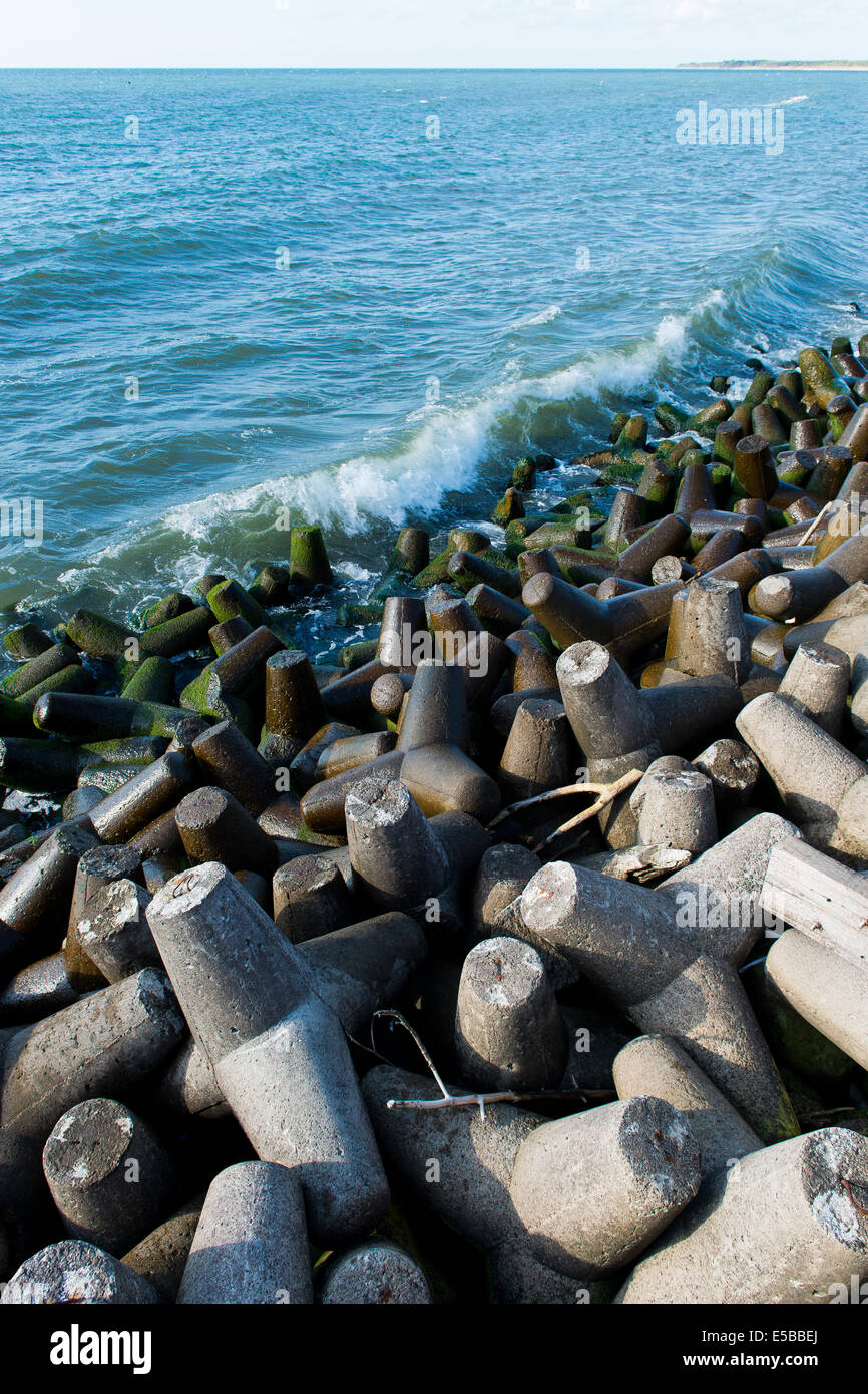 breakwater - many huge stones, the horizon Stock Photo - Alamy