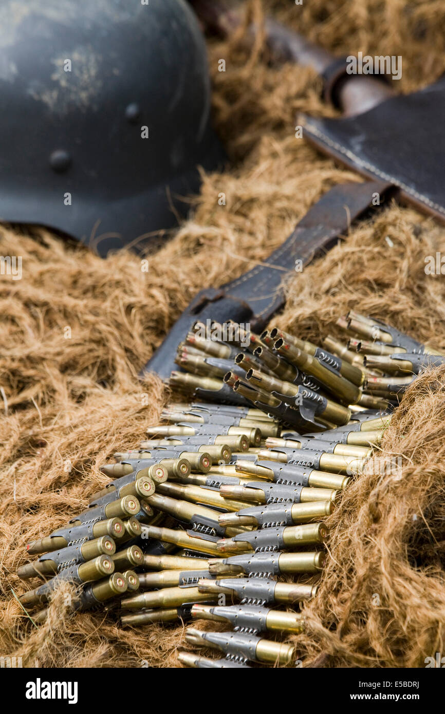 Metal belt with machine gun cartridges on Hessian string Stock Photo ...