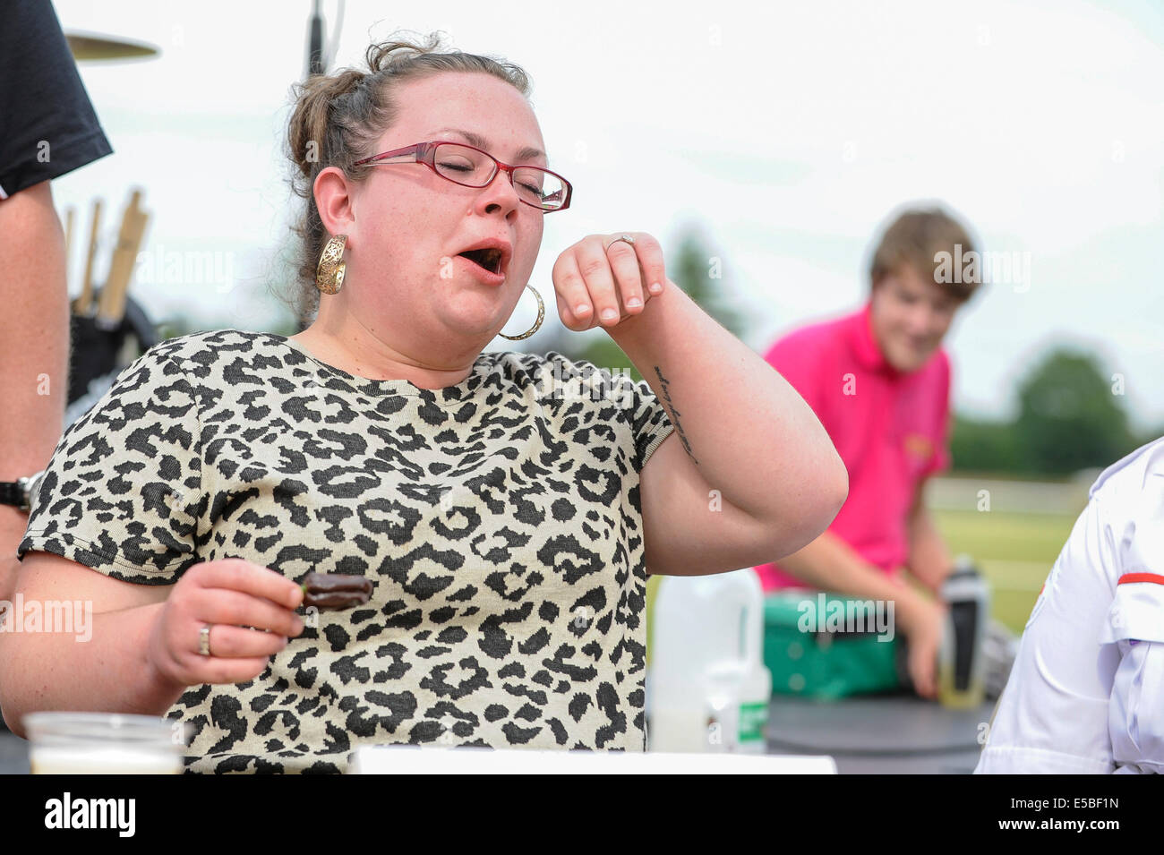 Chilli eating contestant hi-res stock photography and images - Alamy