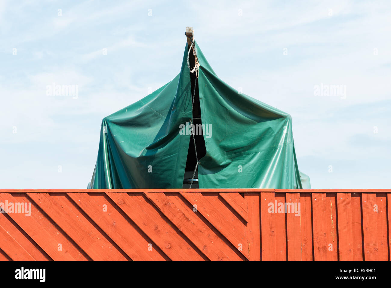 Boat covered in shipyard Stock Photo - Alamy