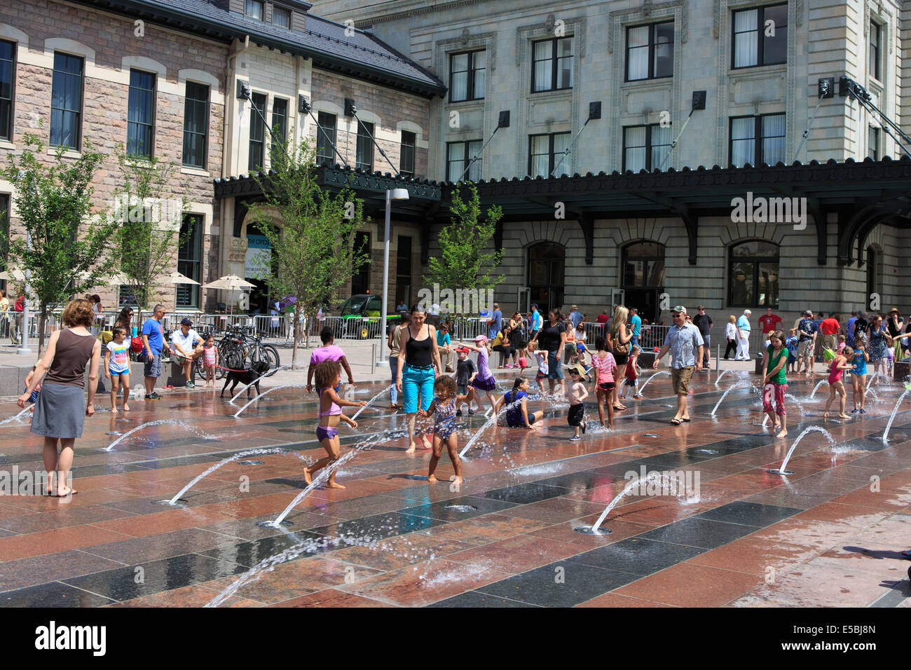 Denver Colorado USA - 26th July 2014. Children play on the splash pad ...