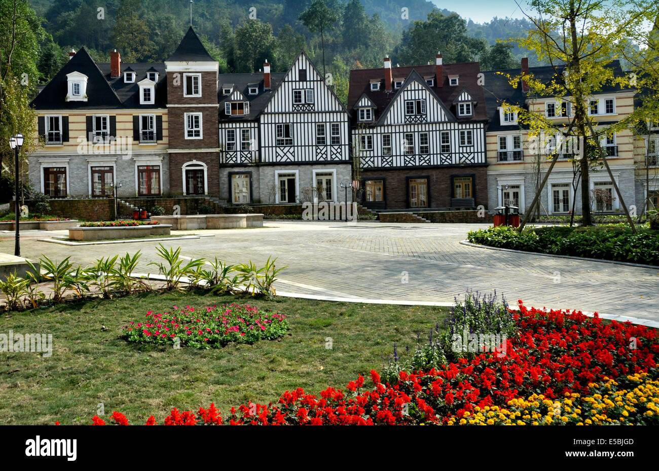 BAI LU TOWN, CHINA: A row of half-timbered and stucco medieval-style ...
