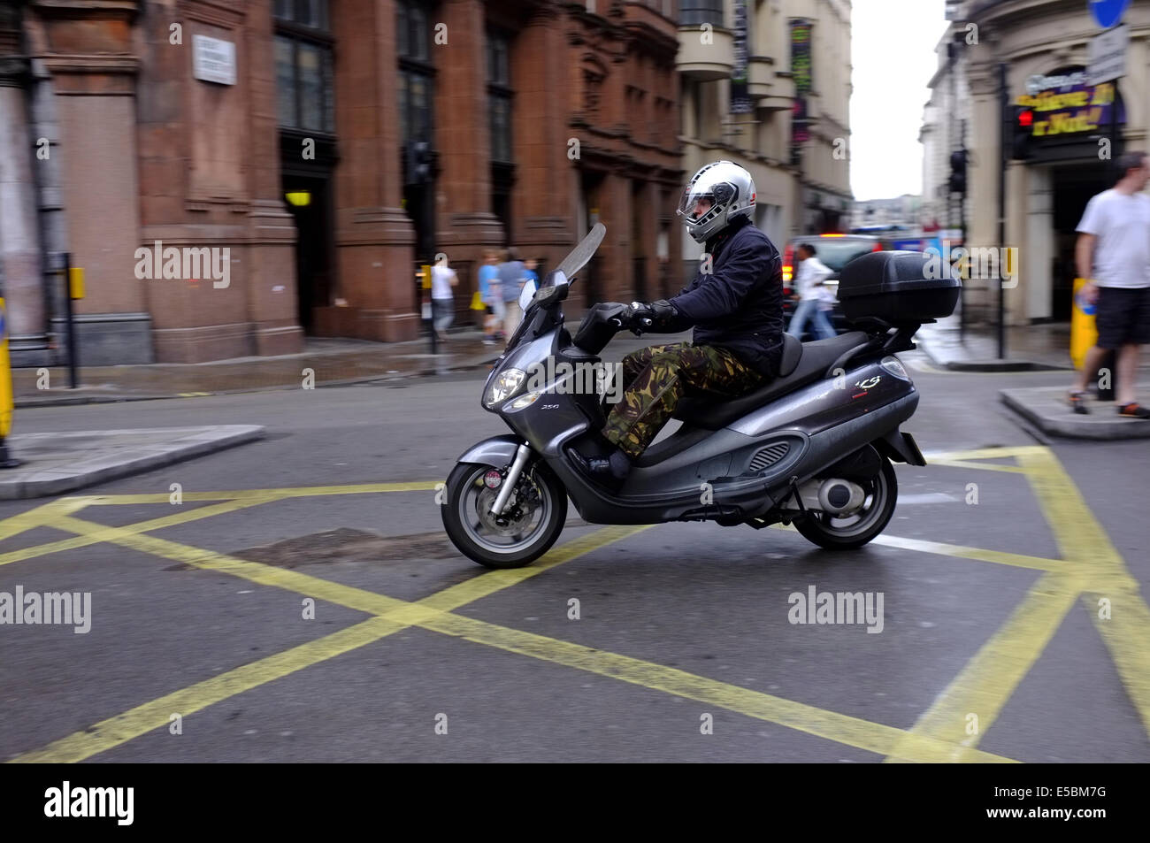 Moped rider london hi-res stock photography and images - Alamy