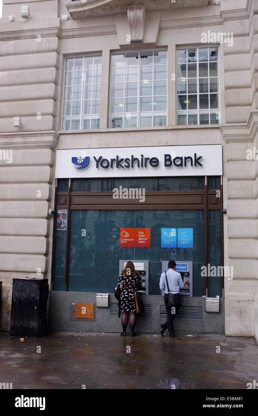 Yorkshire Bank with people at cash machines in London Stock Photo - Alamy