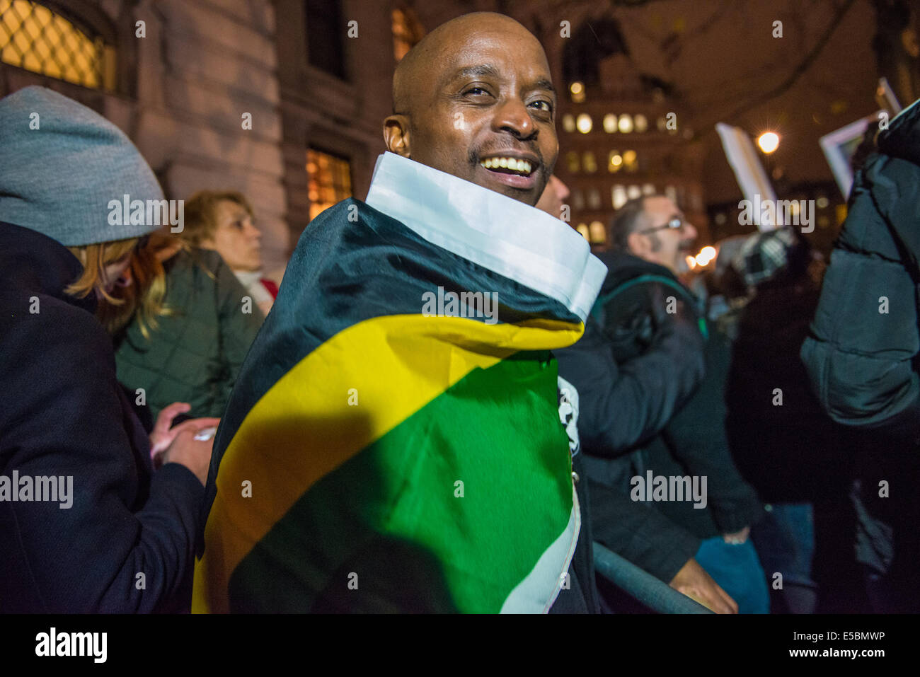 Vigil to mark Nelson Mandela's passing at Trafalgar Square in London ...