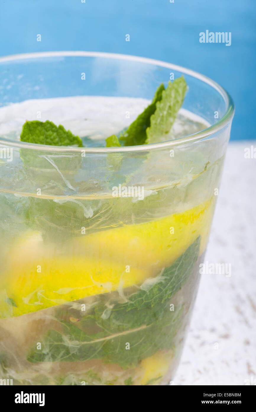 close up mochito drink in blue background Stock Photo - Alamy