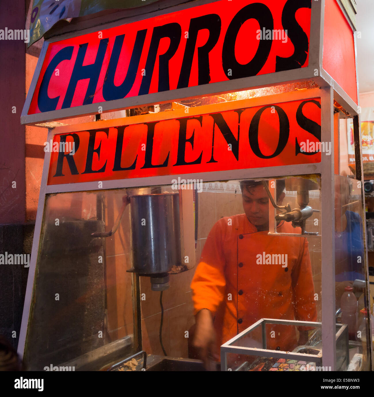Street vendor in Puebla, Mexico selling Churros and Rellenos Stock ...