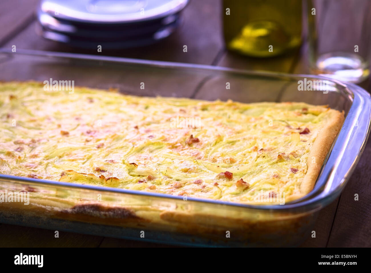Traditional German Zwiebelkuchen or onion cake, made of a yeast dough ...