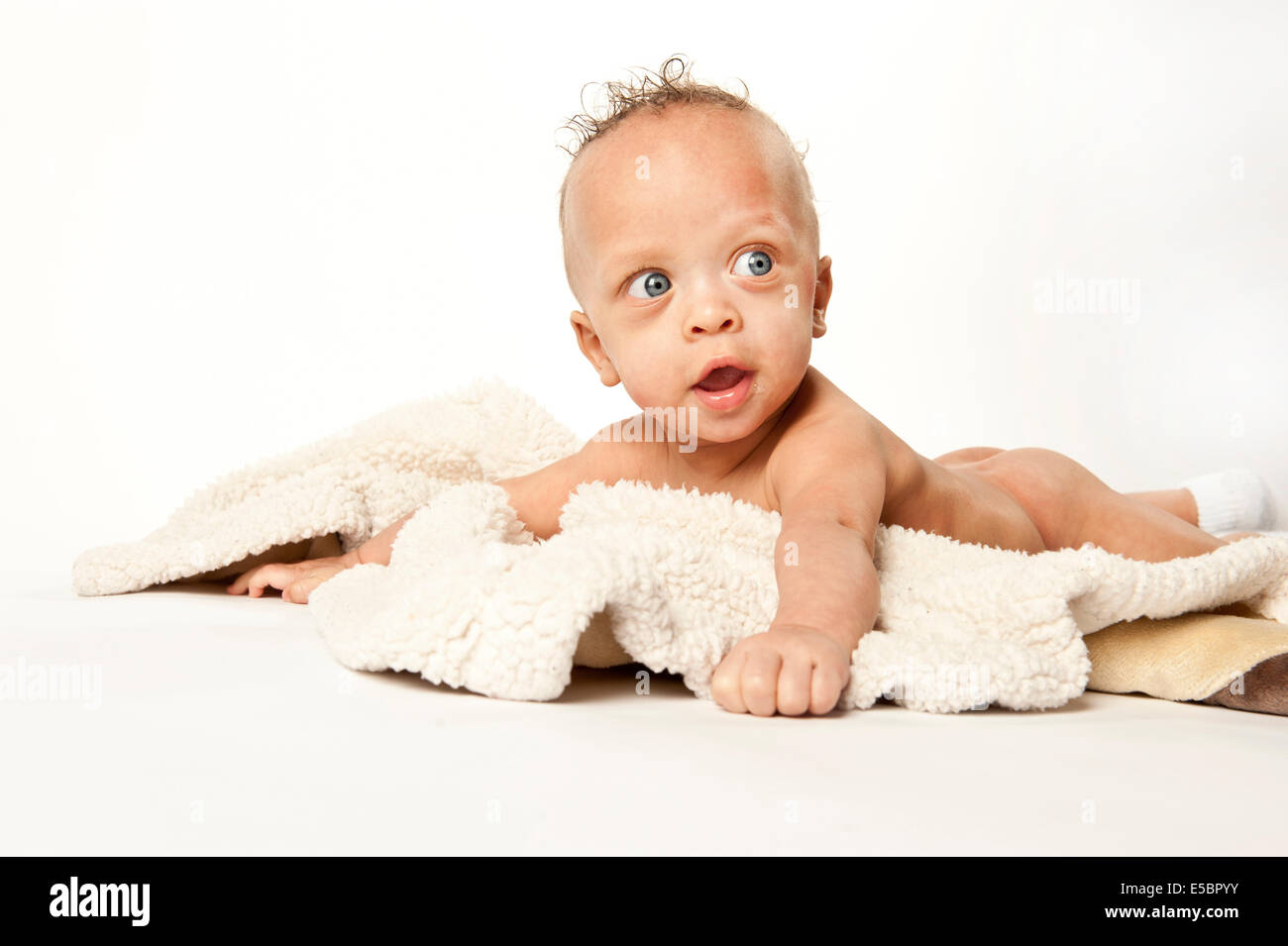 A cute baby isolated on a white background Stock Photo - Alamy