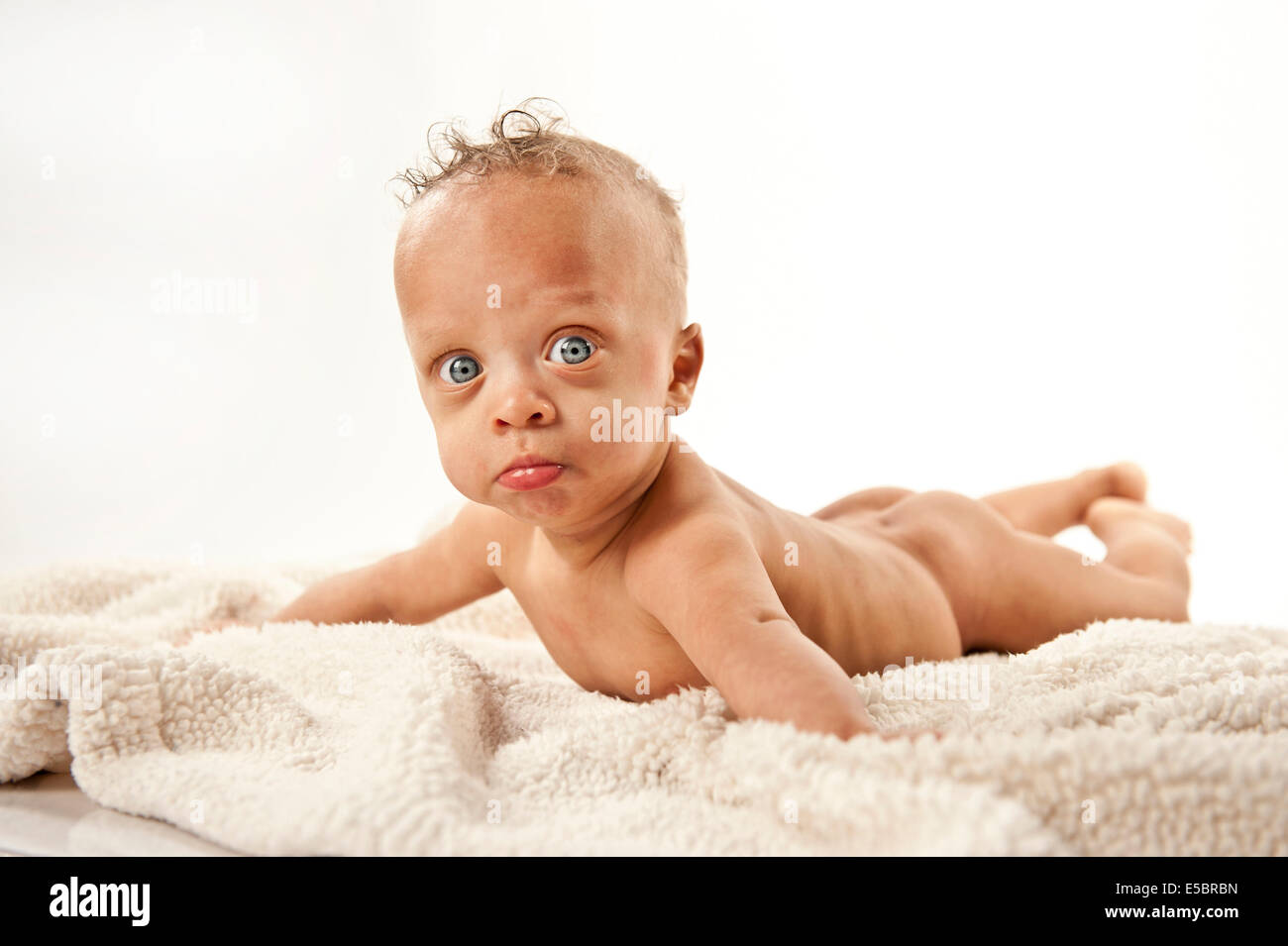A cute baby isolated on a white background Stock Photo - Alamy