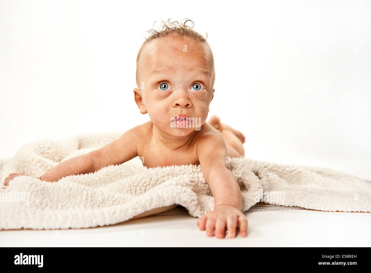 A cute baby isolated on a white background Stock Photo - Alamy