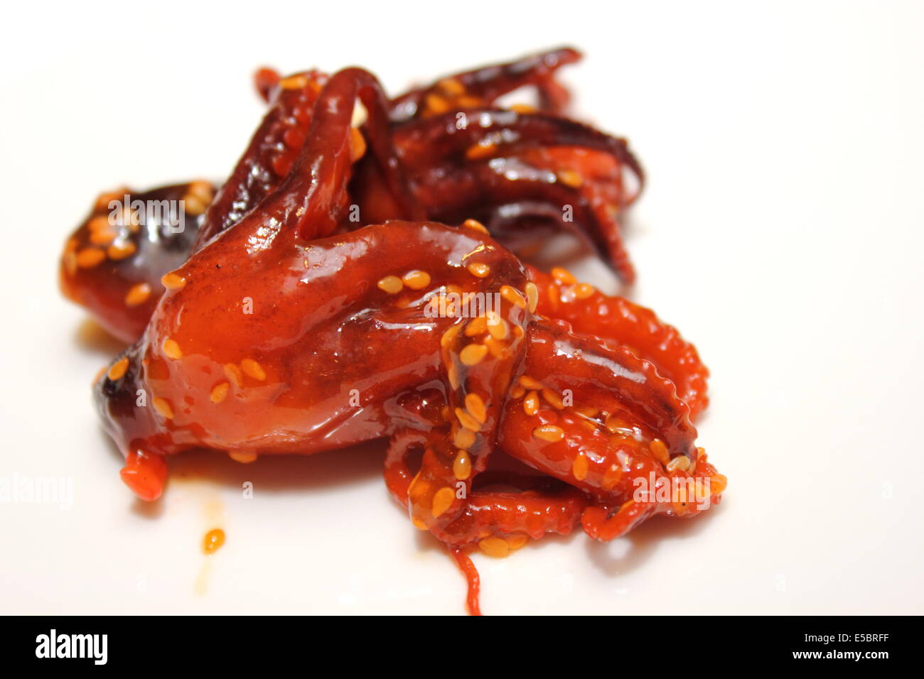 Pickled baby squid Japanese cuisine on white Stock Photo - Alamy