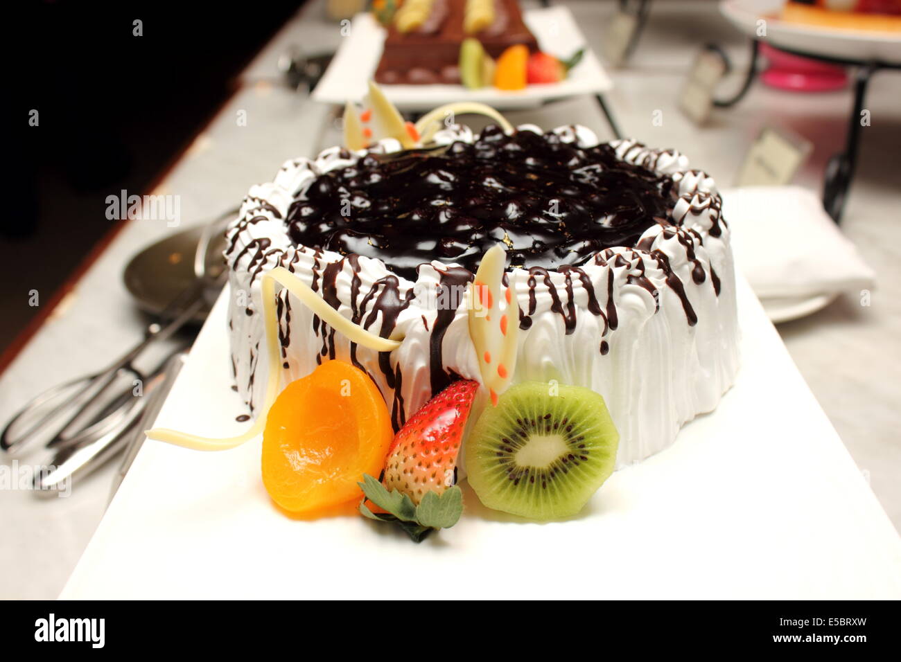 Delicious slice of blueberry cake with fresh fruit Stock Photo - Alamy