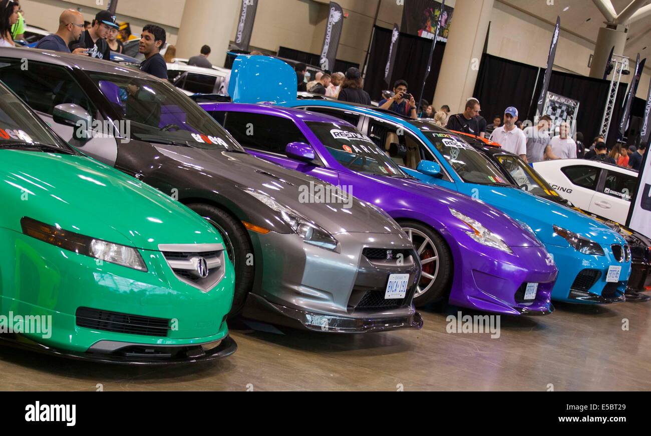 Toronto, Canada. 26th July, 2014. People watch tuned cars during the ...