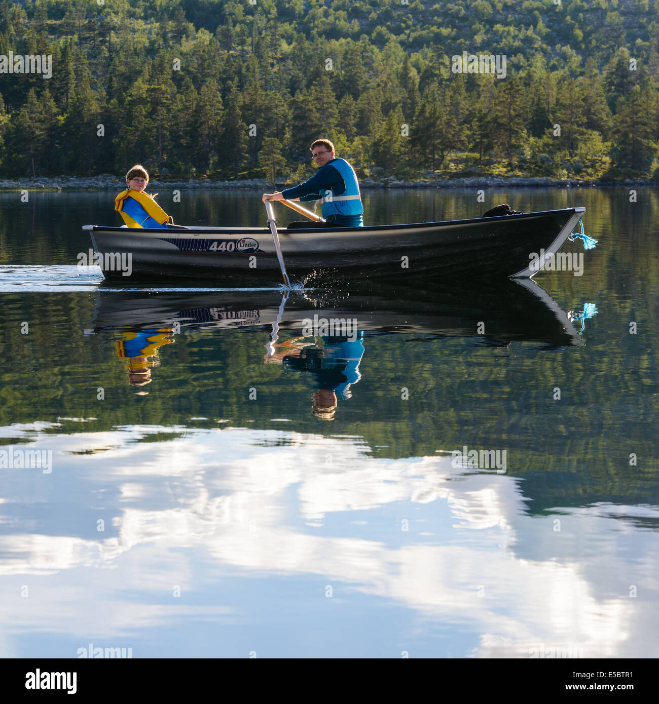 Children rowing boat hi-res stock photography and images - Alamy