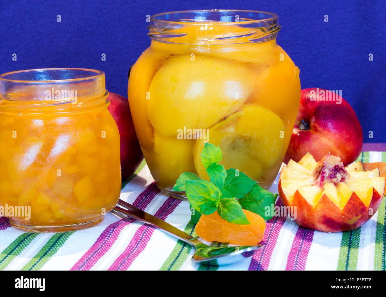 Peach plum cut in half hi-res stock photography and images - Alamy