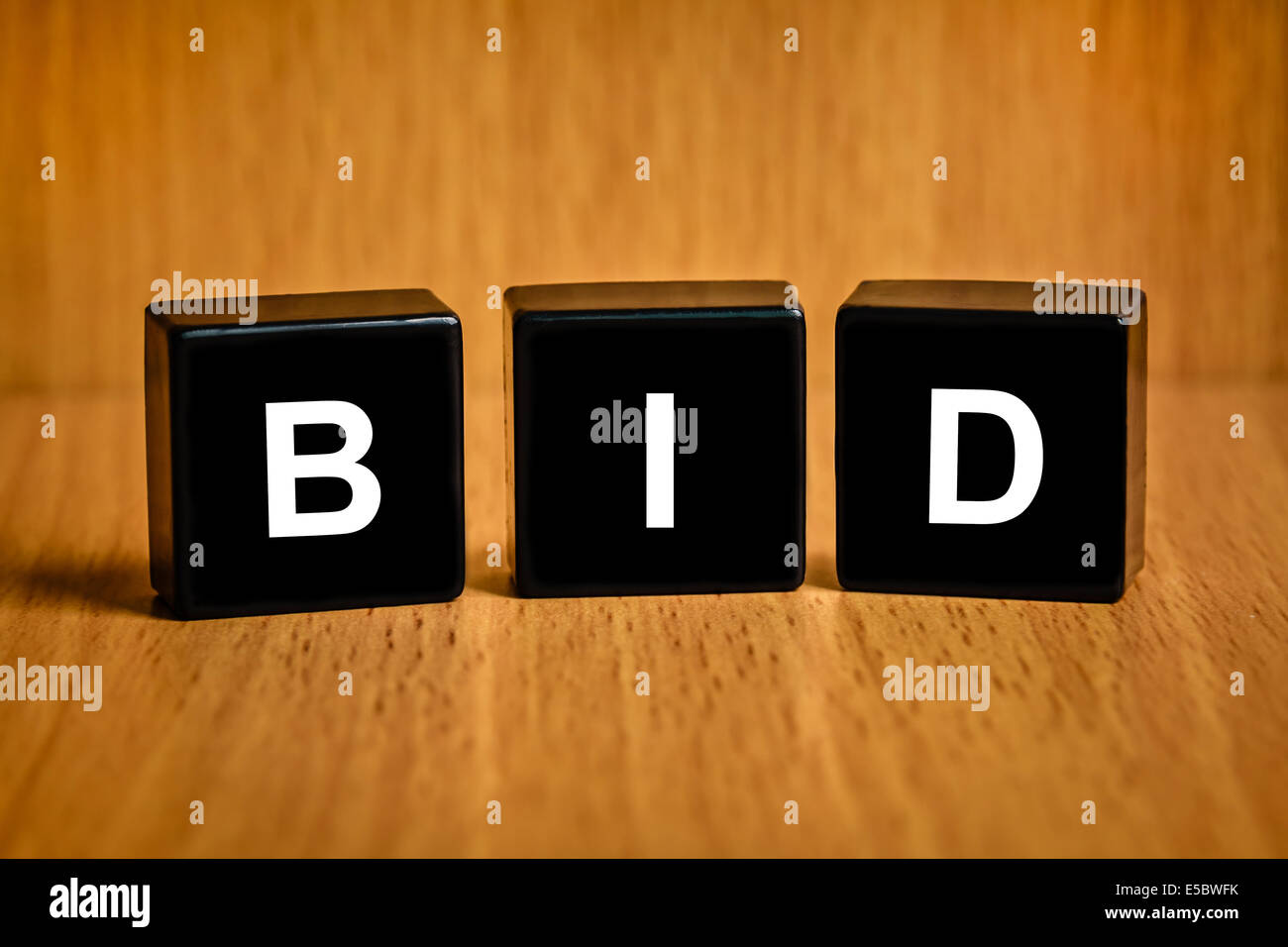 bid text on black block, business concept Stock Photo - Alamy