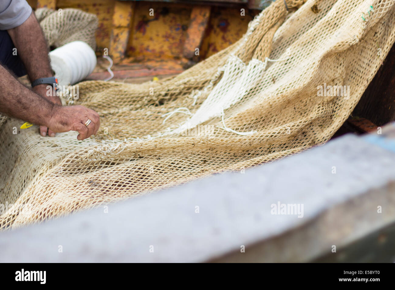 Fishing net weaving hi-res stock photography and images - Alamy