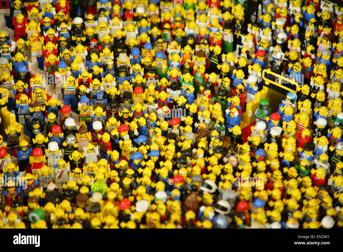 York, UK, 27 July 2014. Hundreds of Lego people cheering at a stadium ...