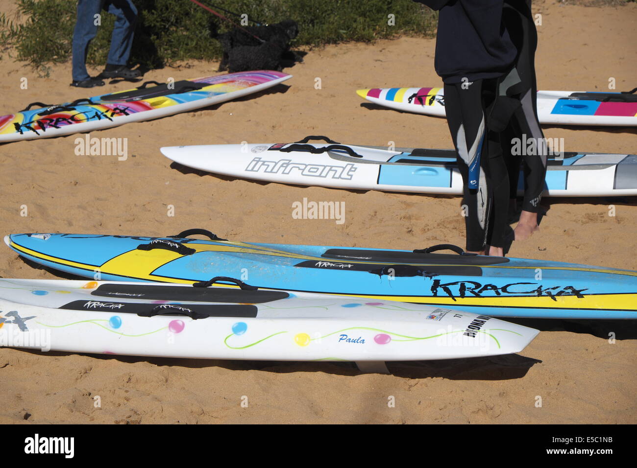Surf boards and surfers legs on sydney's mona vale beach,new south ...