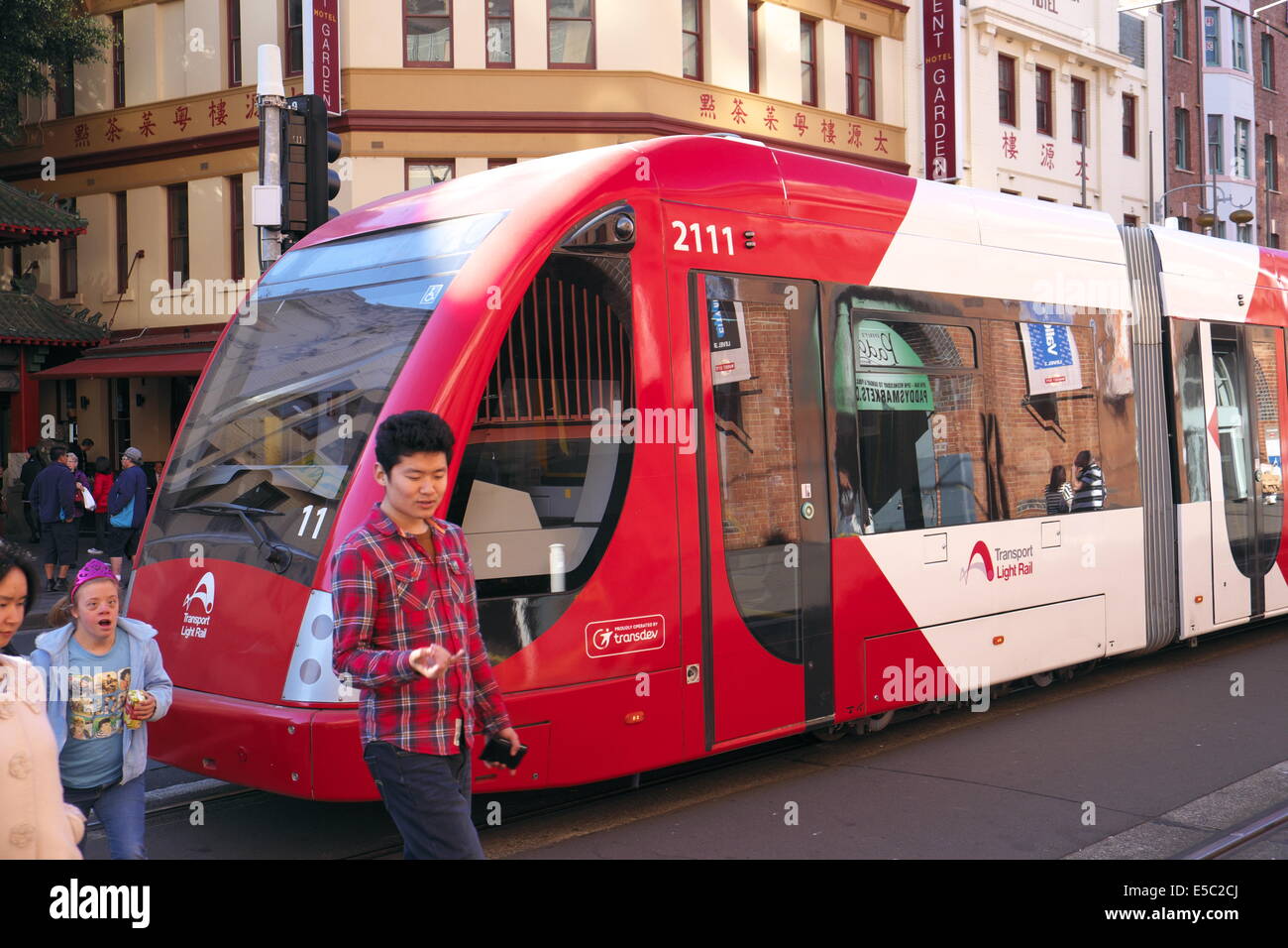 Sydney light rail vehicle running through haymarket Chinatown, Sydney ...
