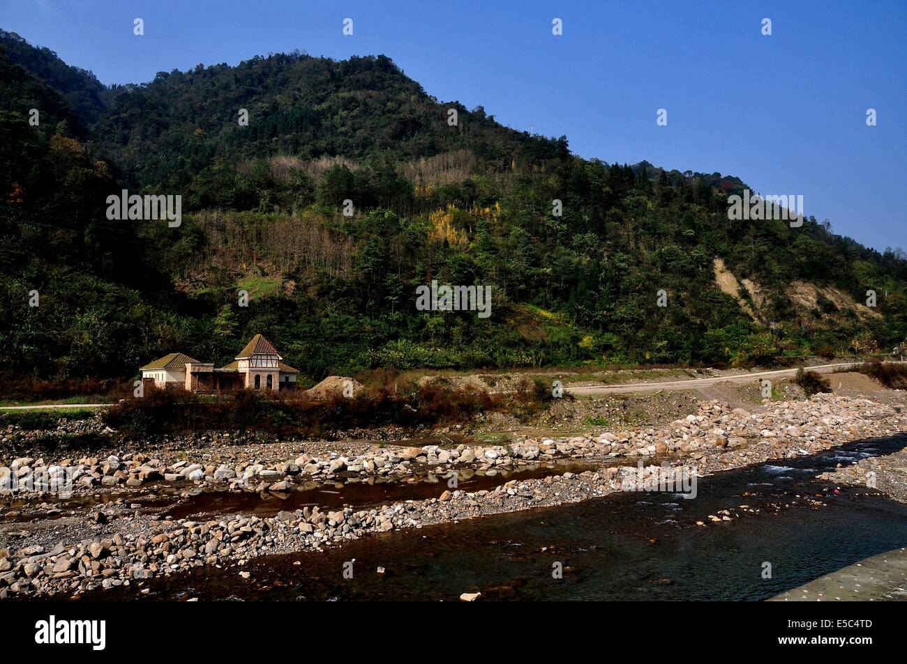 SICHUAN PROVINCE, CHINA: The JinJiang River's rocky bed flowing past ...