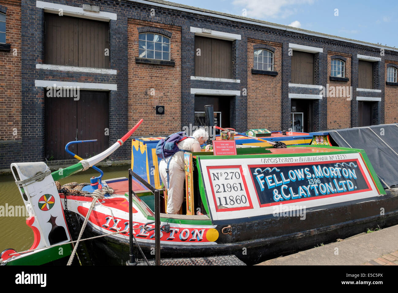 Tourist entering old narrowboat Ilkeston on display at National ...