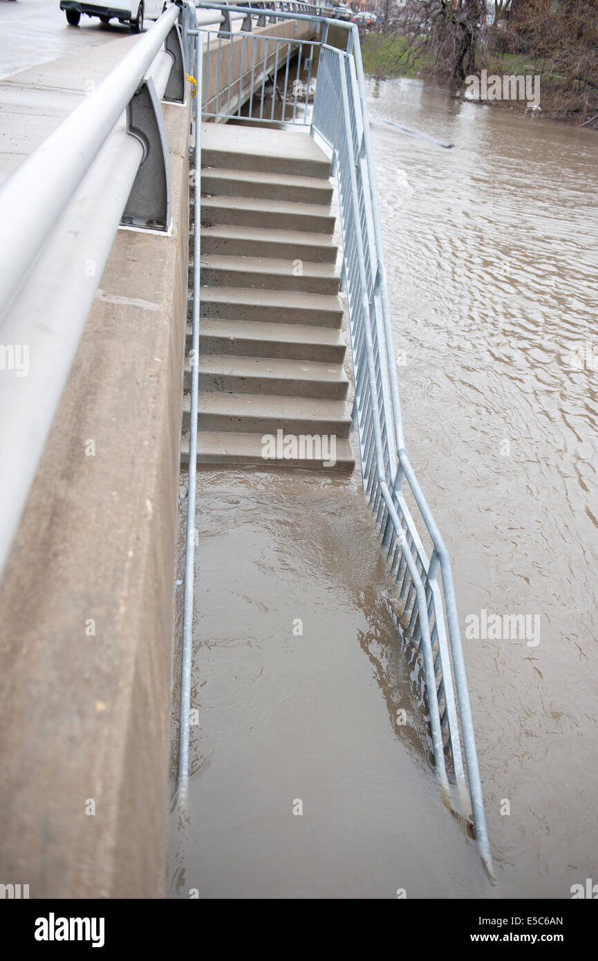 A flooded staircase that leads to a park in the Chicago area Stock ...