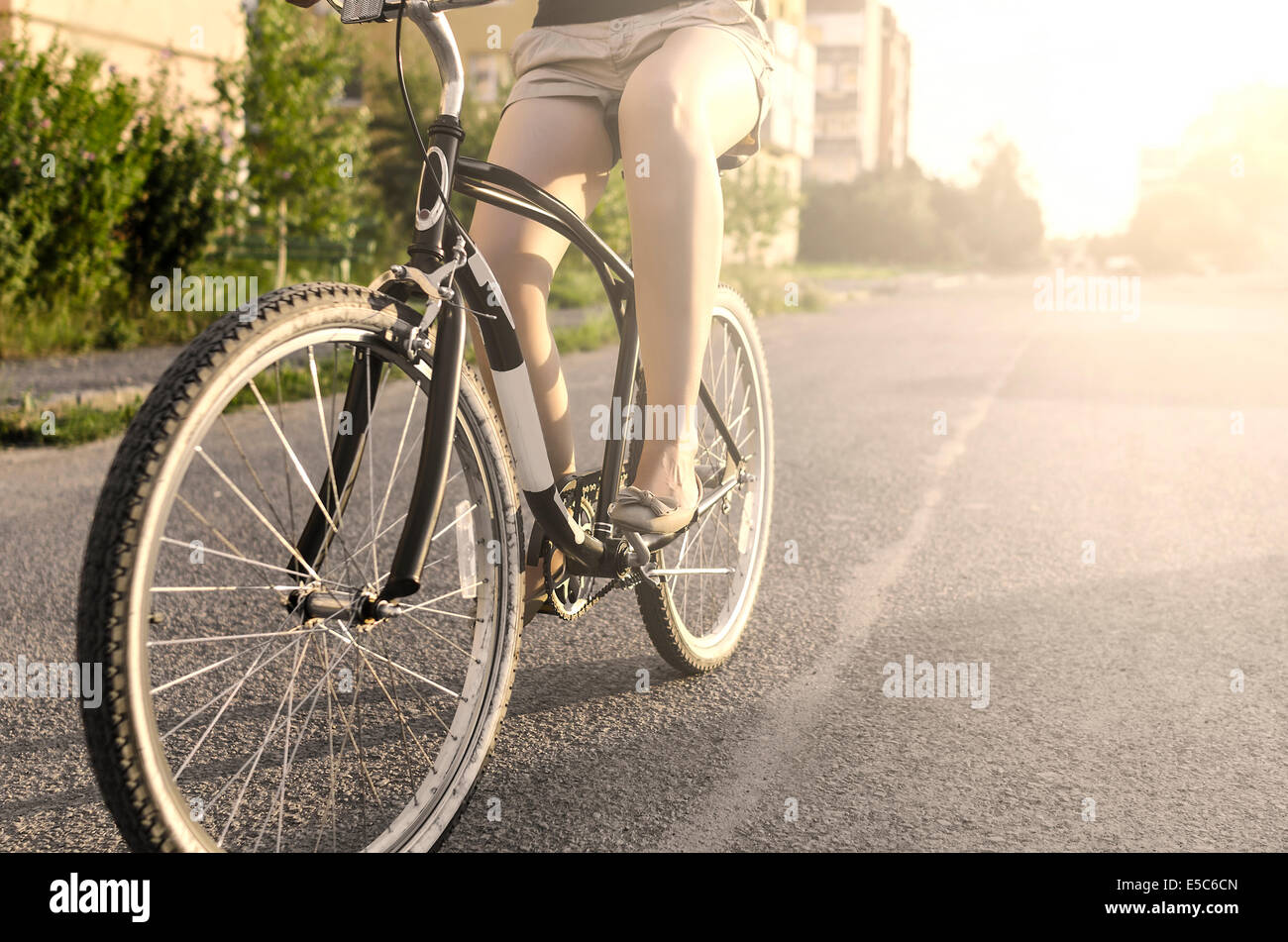Cyclist rides through city hi-res stock photography and images - Alamy