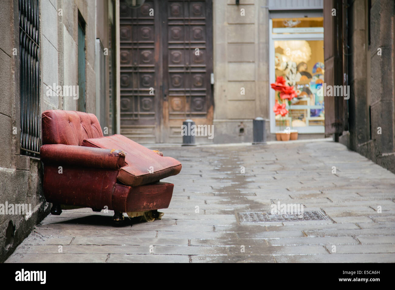 Old couch on street in Barcelona Stock Photo - Alamy
