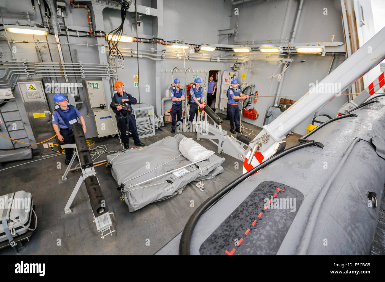 Belfast, Northern Ireland. 26/07/2014 - Crew on board HMS Duncan winch ...