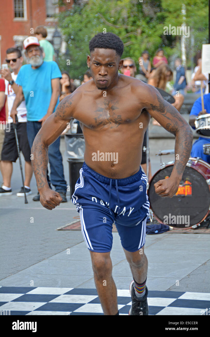 A menacing looking shirtless young muscular man in New York City Stock ...