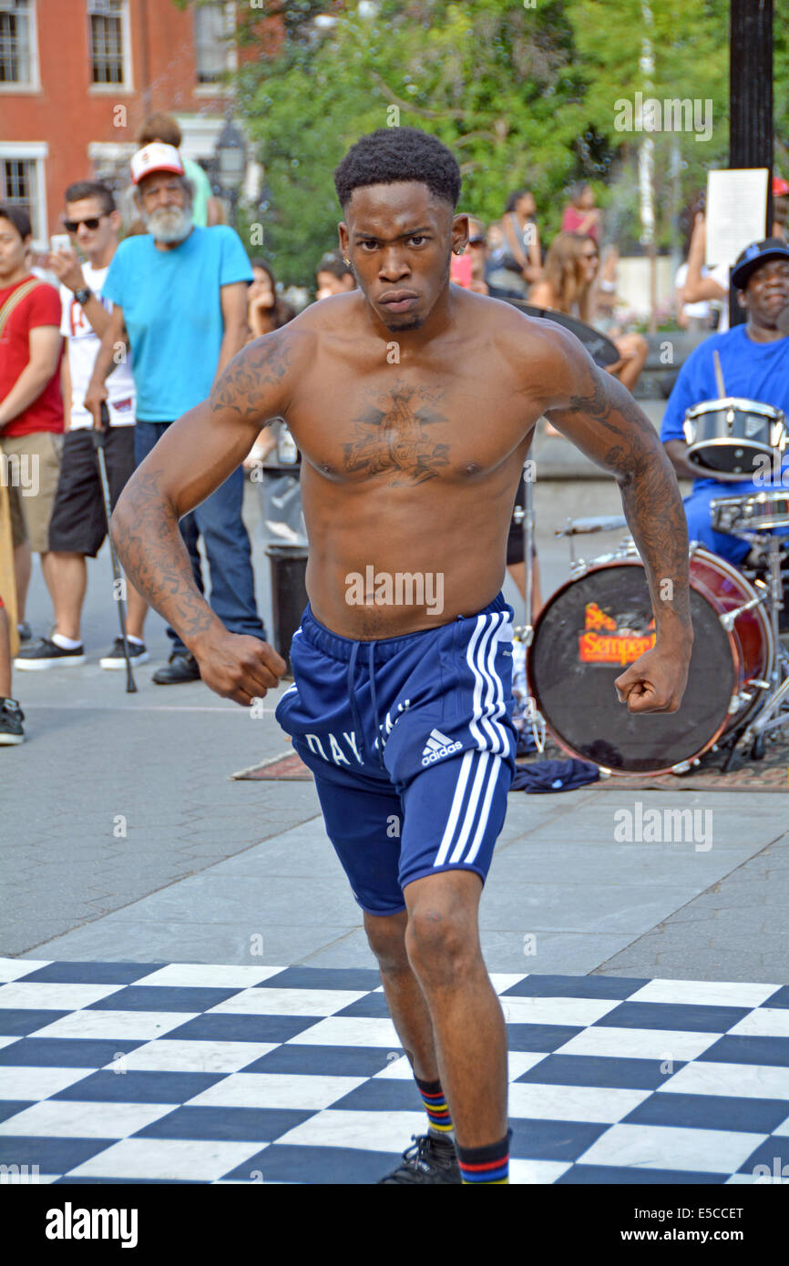 A menacing looking shirtless young muscular man in New York City Stock ...
