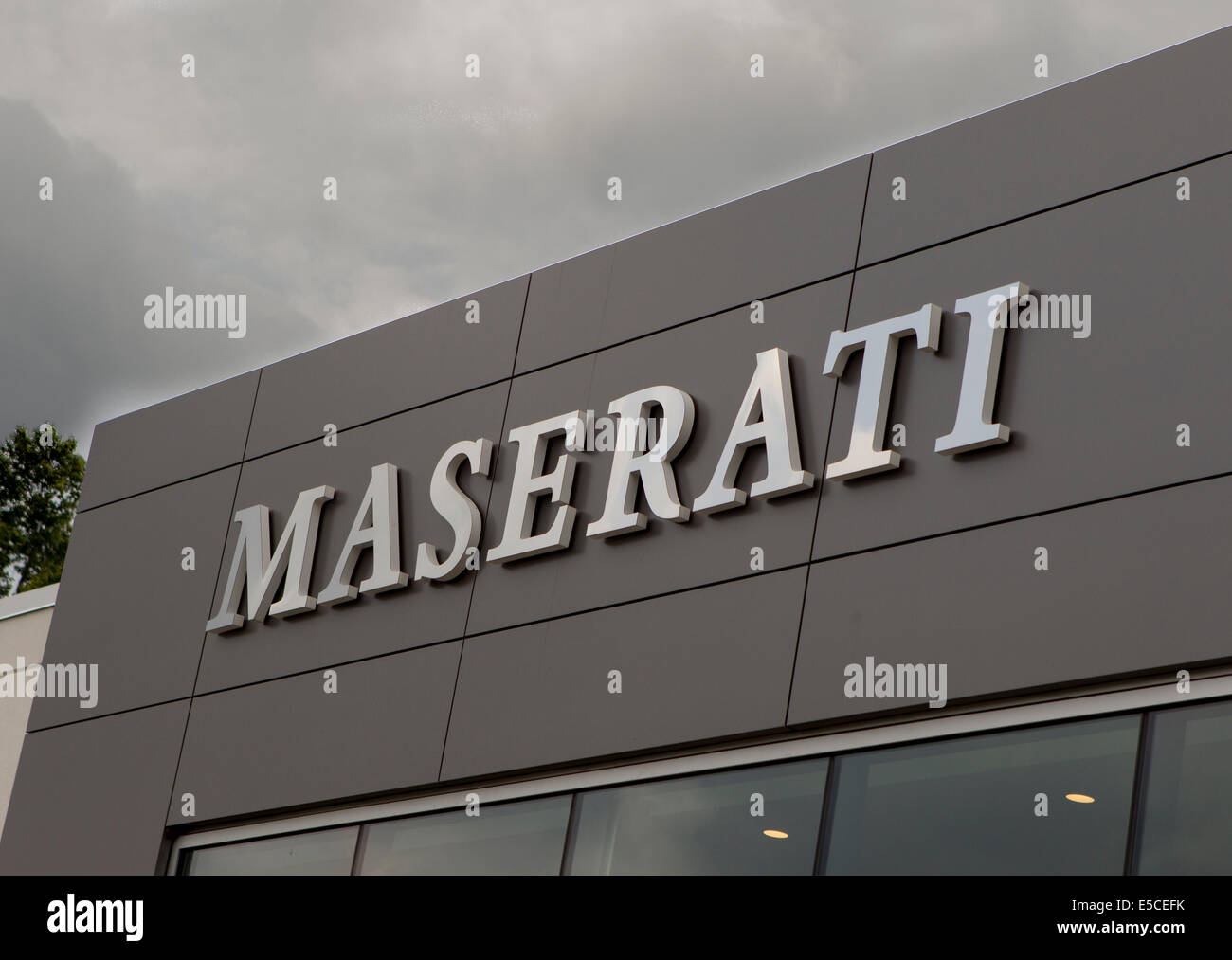 Maserati sign at a car dealership Stock Photo - Alamy