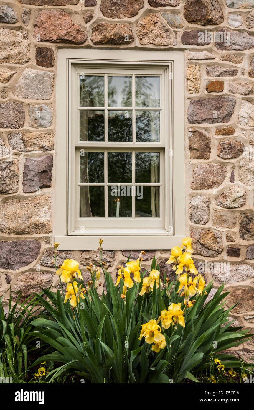 Close up old colonial stone house kitchen window frame, Amish farm with ...