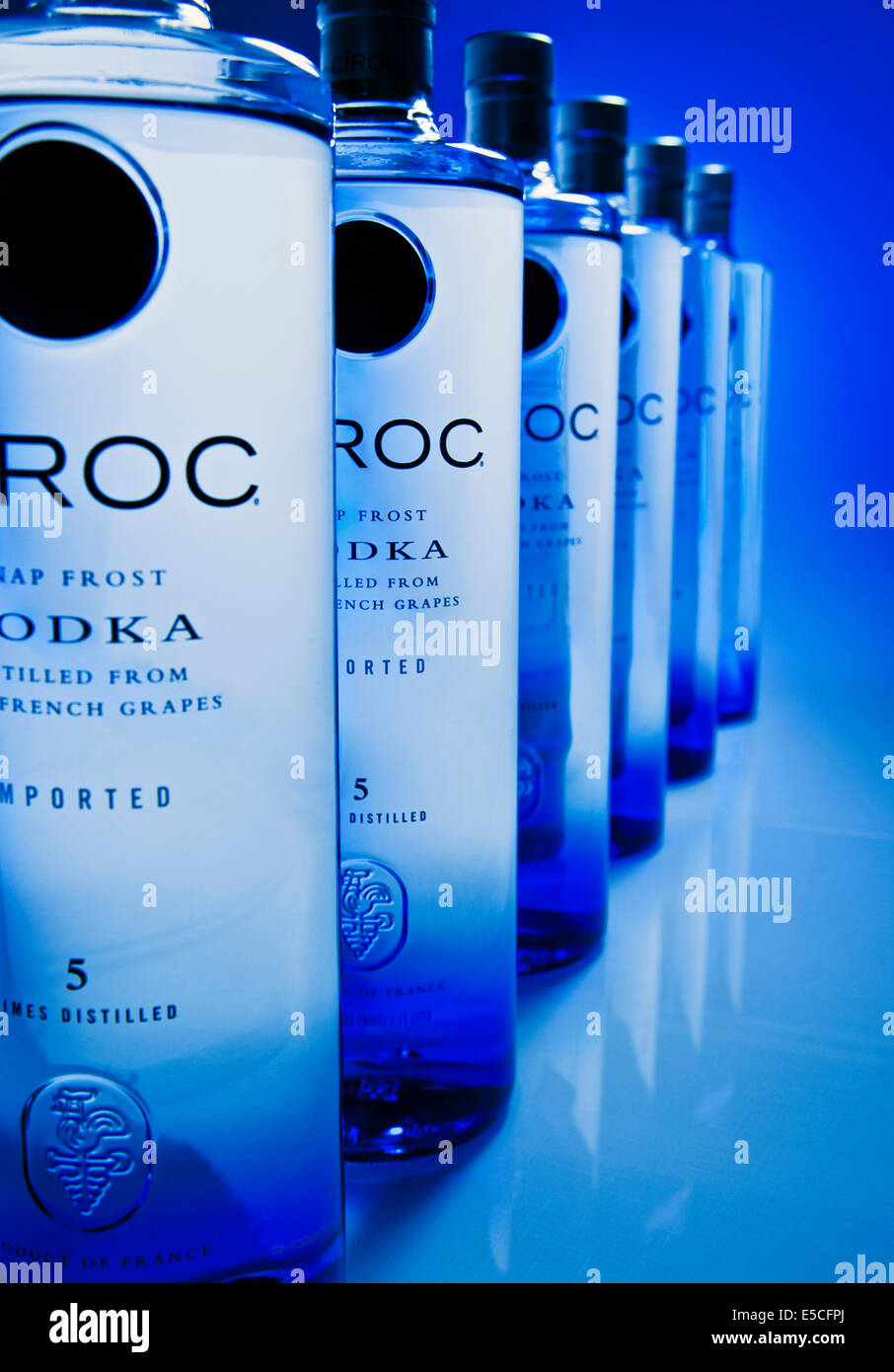 Ciroc Vodka bottles line up in perspective with a blue background Stock ...