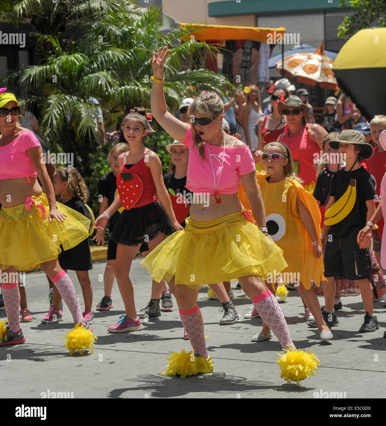 A group of children and adults dancers dance in the street at the 2014 ...