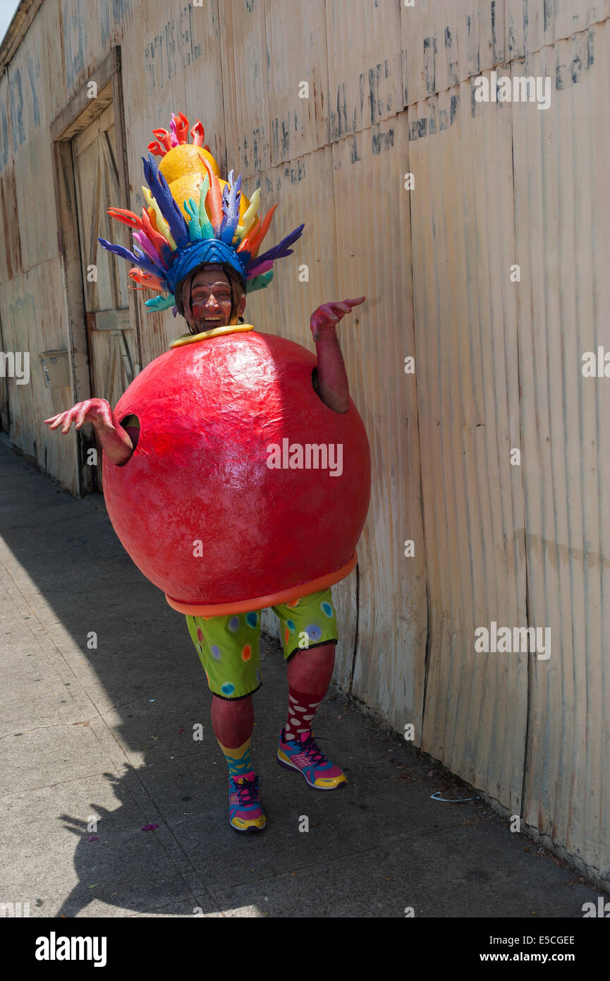 A participant with a creative rolling costume & elaborate headdress at ...