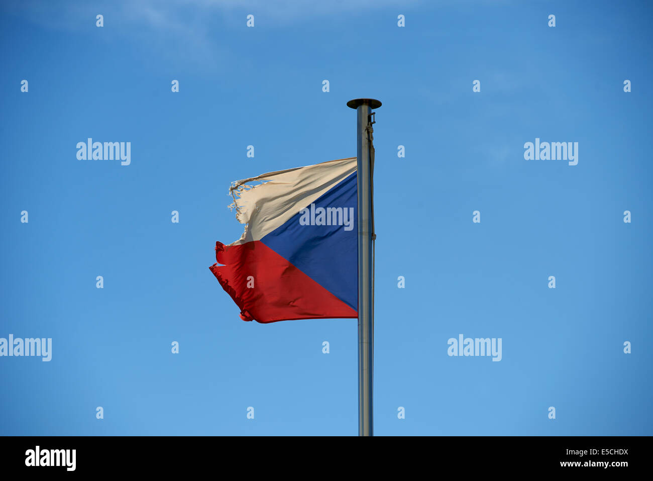 Czech Republic Flag old, isolated on blue sky background, waving in the ...