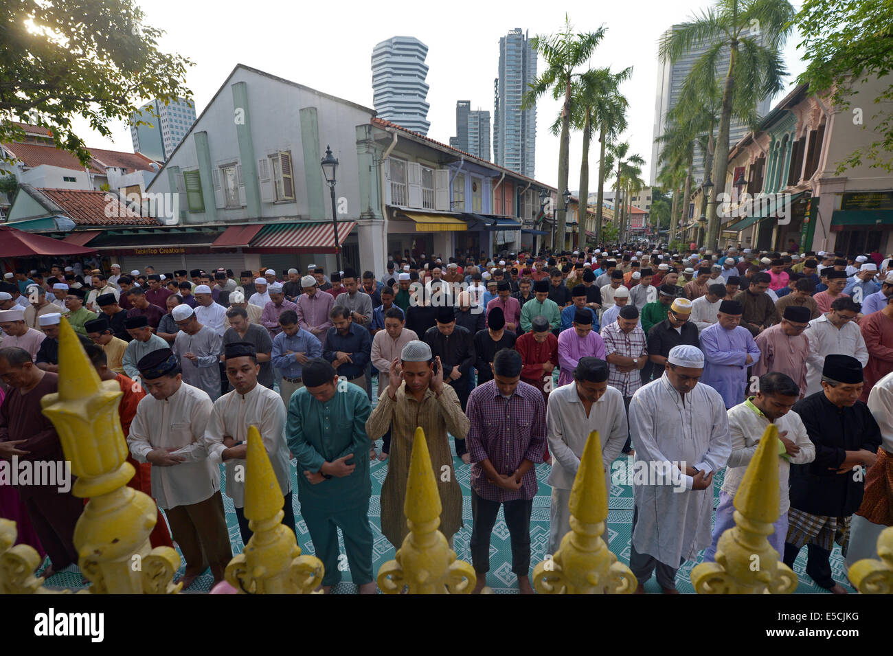 Singapore. 28th July, 2014. Muslims attend morning prayers held at ...