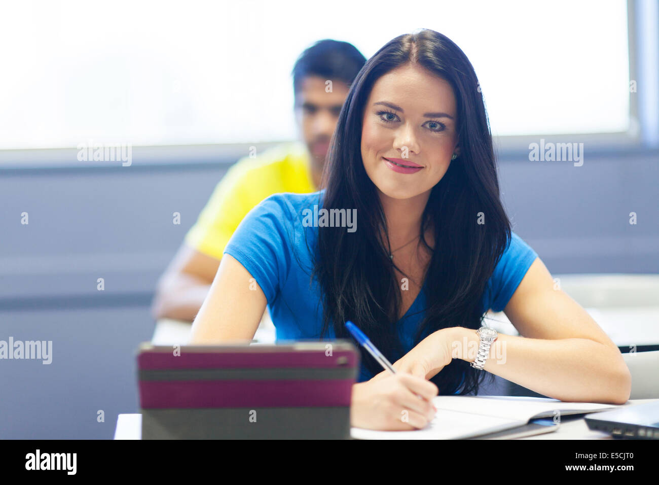 portrait of beautiful female college student in lecture room Stock ...