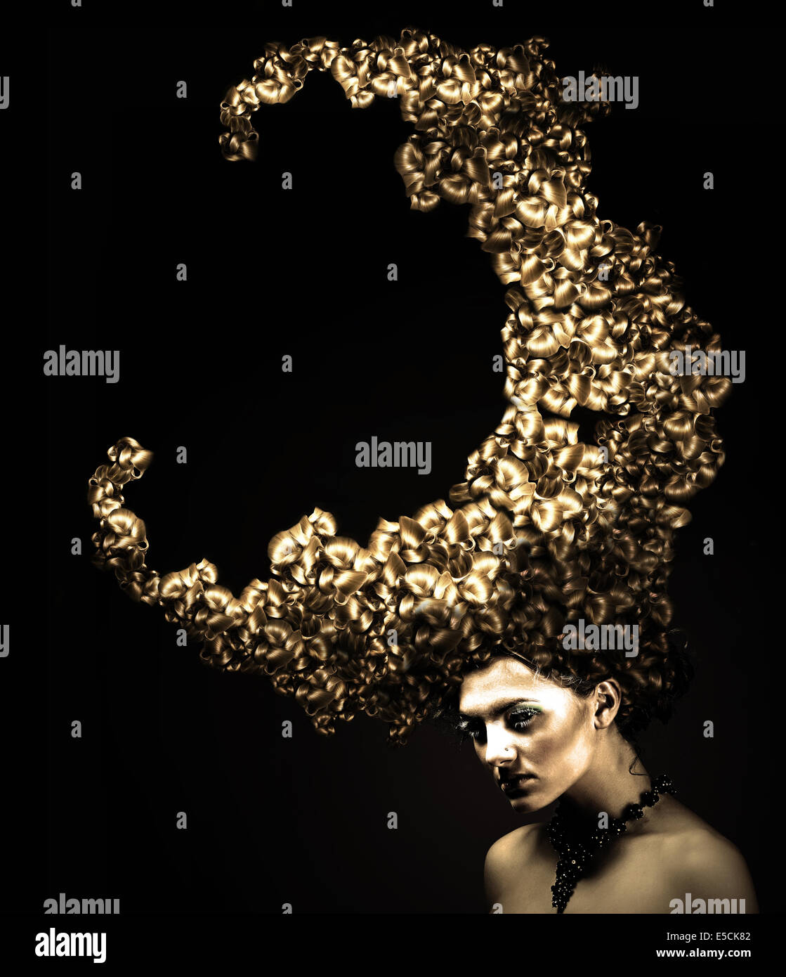 Beautiful woman with gold hair moon Stock Photo - Alamy